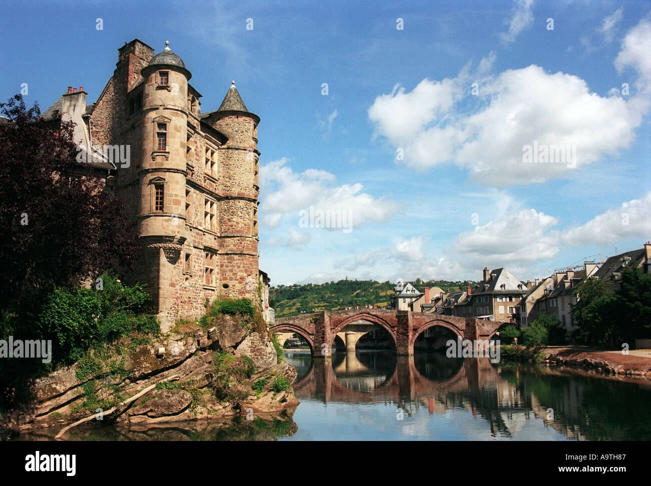 The sandstone packhorse bridge and Chateau built 1572 Espalion Lot ...