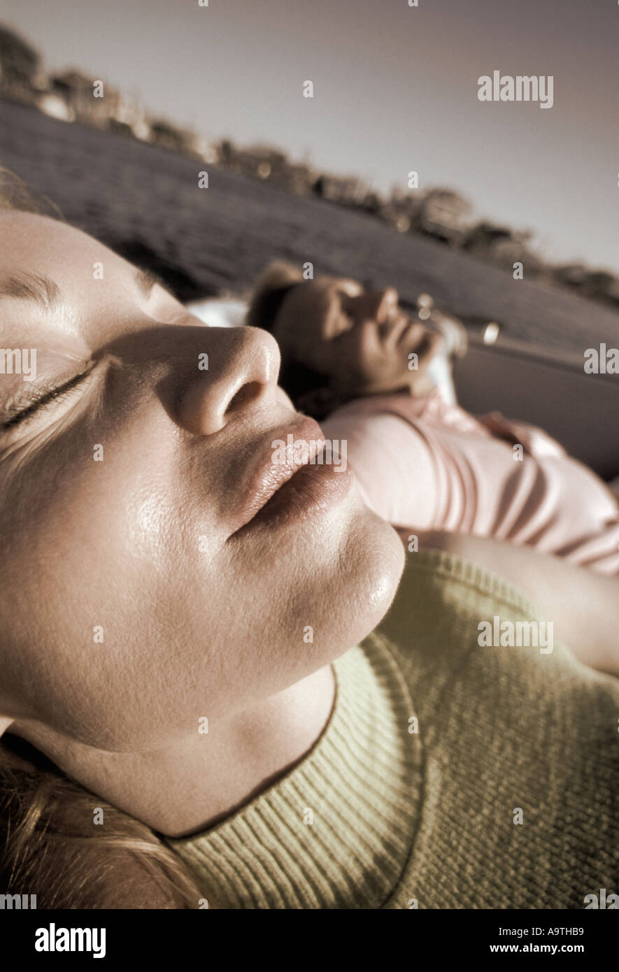 Couple tanning boat hi-res stock photography and images - Alamy