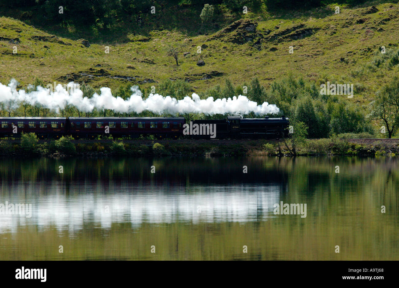 Jacobite Steam Train Scotland travelling past Loch Eilt Highlands ...