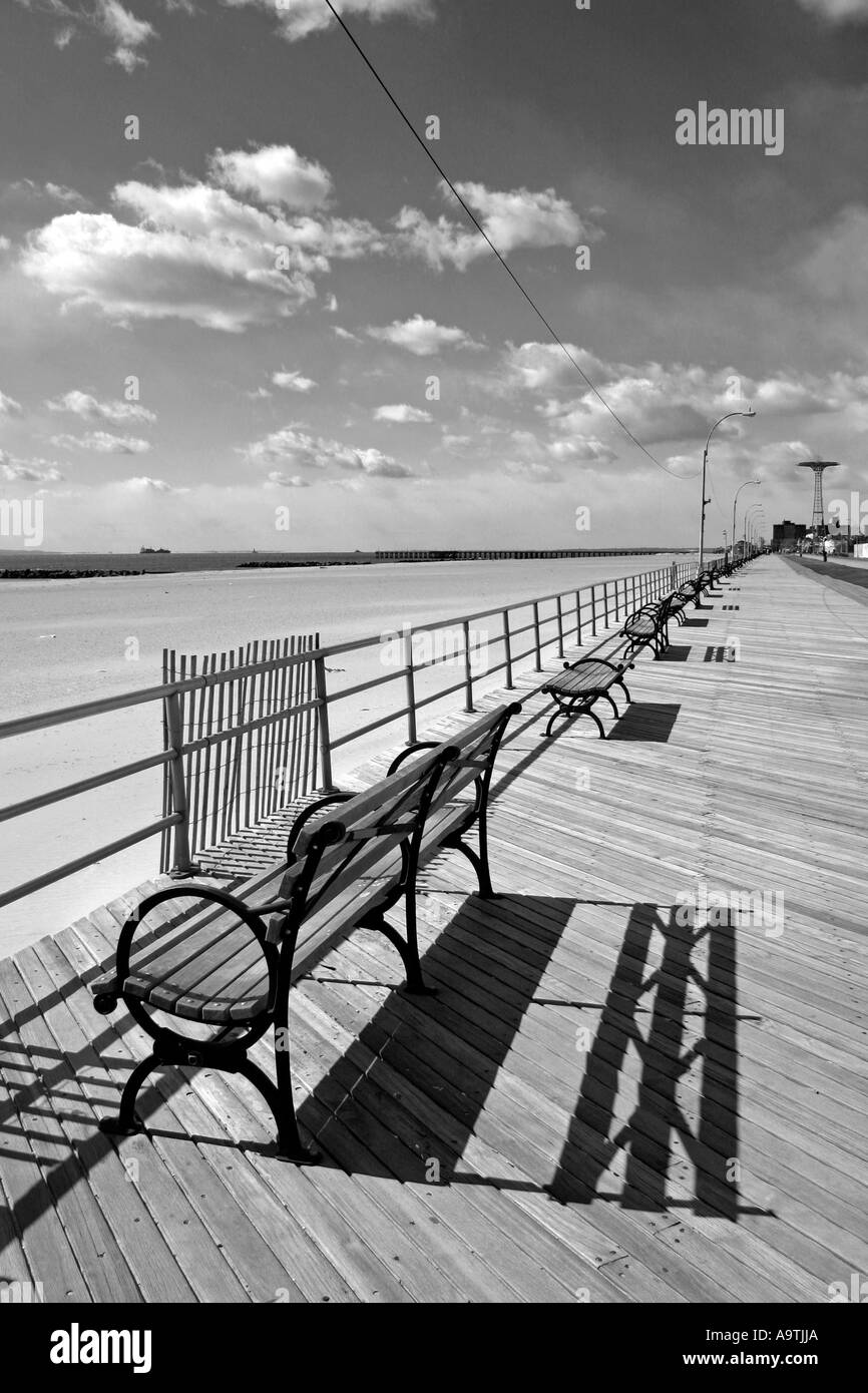 Line of benches on the boardwalk at Coney Island, New York Stock Photo ...