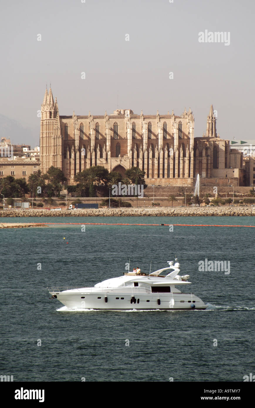 Spanish Roman Catholic landmark Gothic Palma Cathedral with white motor ...