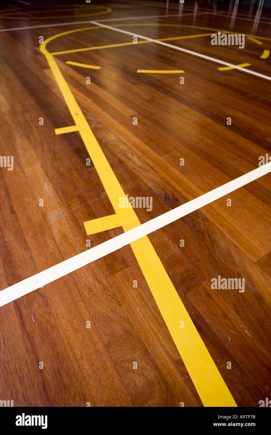 Floor of a school gym hall basketball court Stock Photo - Alamy