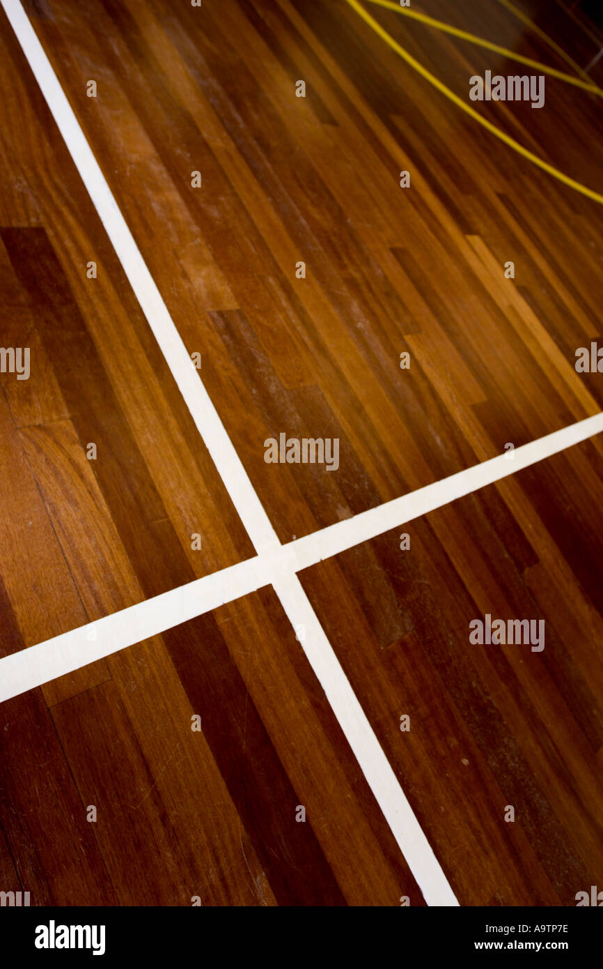Floor of a school gym hall basketball court Stock Photo - Alamy