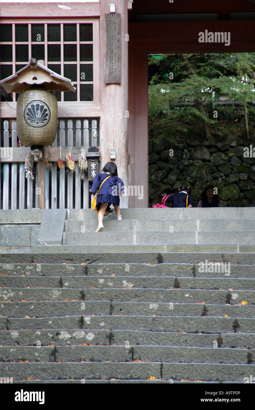 Japanese child climbs temple steps Kyoto Japan Stock Photo - Alamy