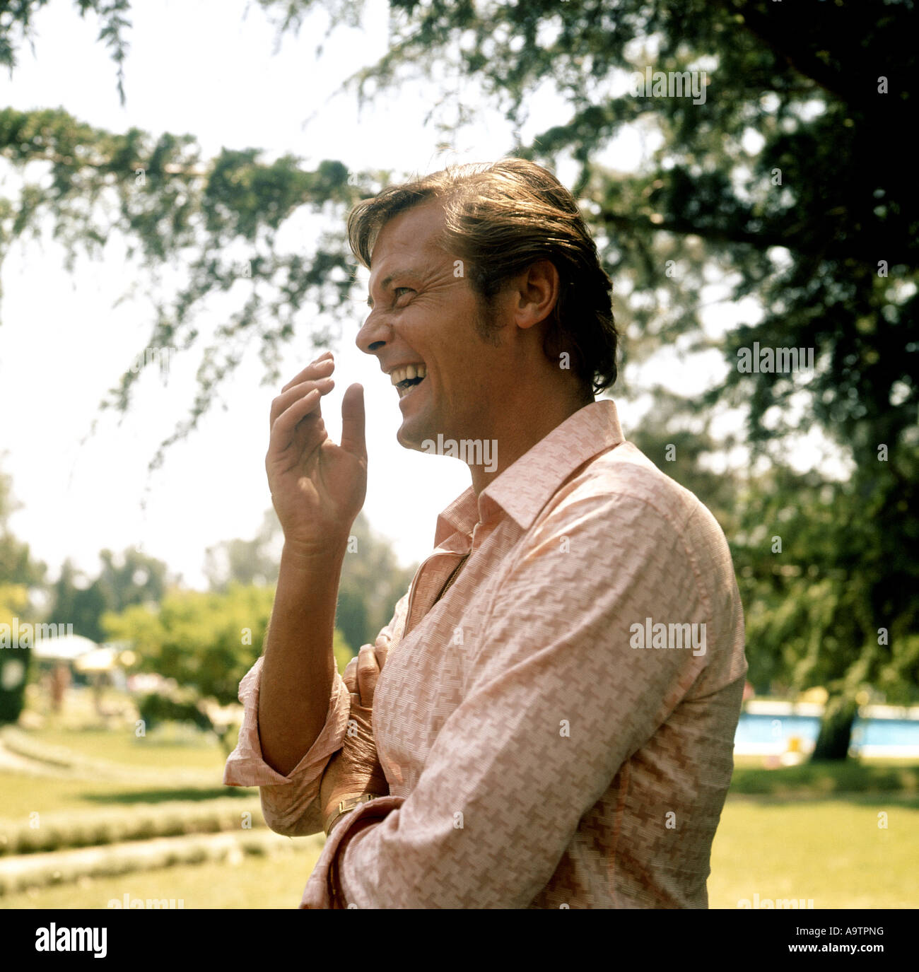 ROGER MOORE - UK film and tv actor about 1970 Stock Photo - Alamy