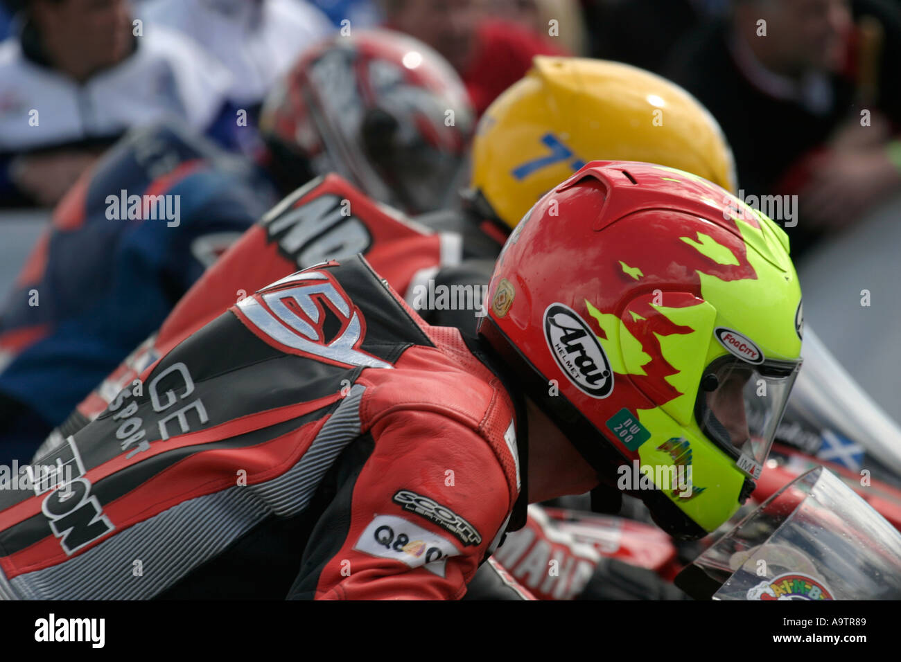 Colourful competitors Ryan Rainey closest Les Shand on the grid at the ...