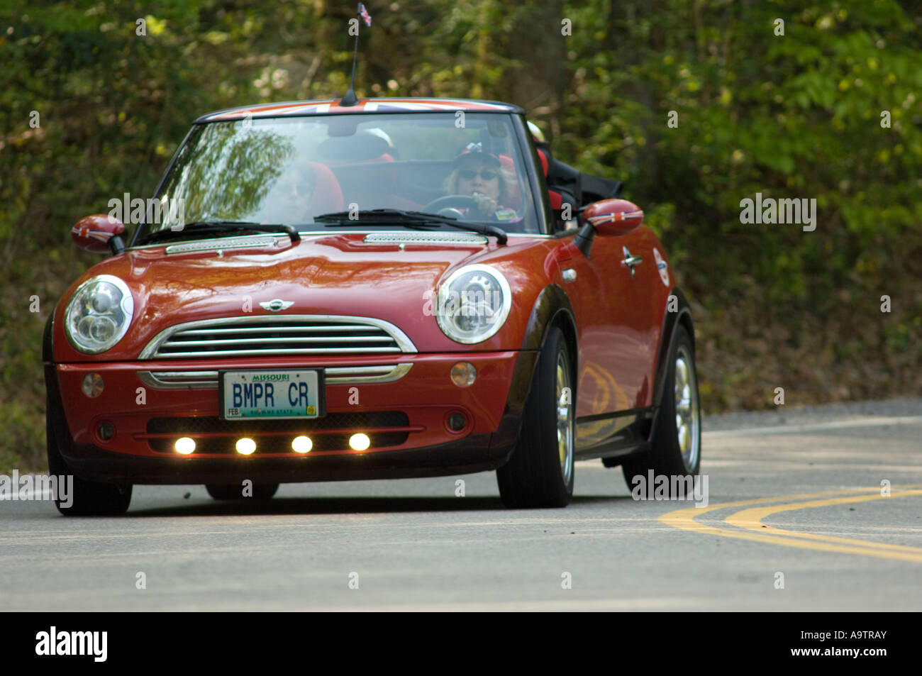 Car rounding a curve hi-res stock photography and images - Alamy
