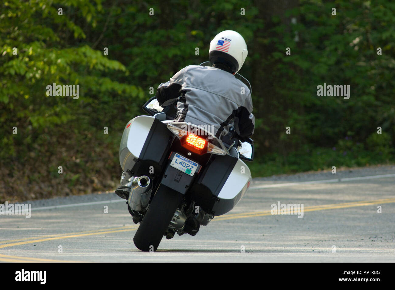 Riding motorcycle helmet country road hi-res stock photography and ...