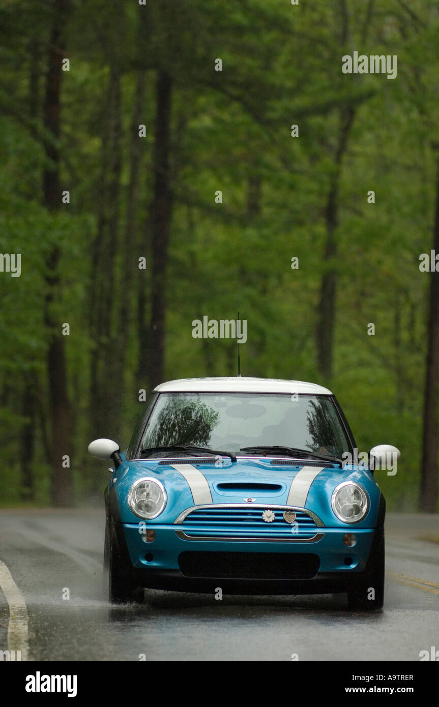 MINI Cooper S on a wet rural road Stock Photo - Alamy
