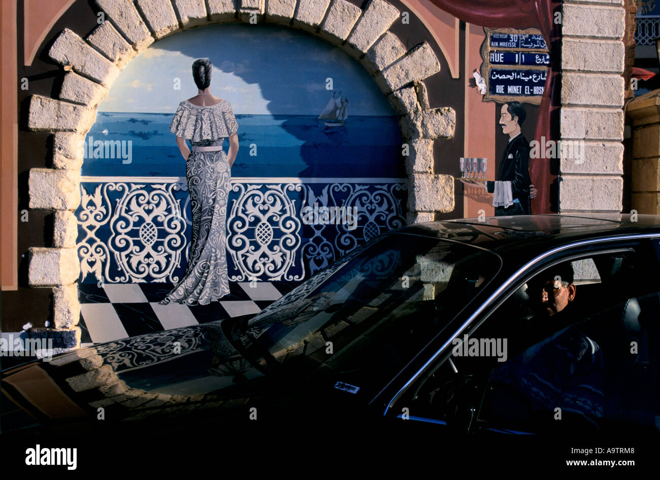 BEIRUT WEST BEIRUT MAN IN CAR NEAR PICTURE IN ARCHWAY CORNICHE SEAFRONT ...