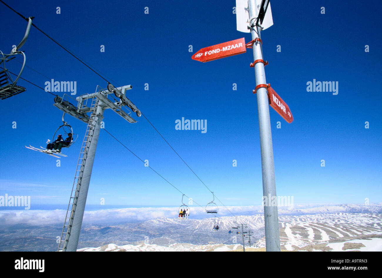 BEIRUT FARAYA MZAAR SKI RESORT SKIERS ON SKI LIFT SNOW MEDITERRANEAN ...