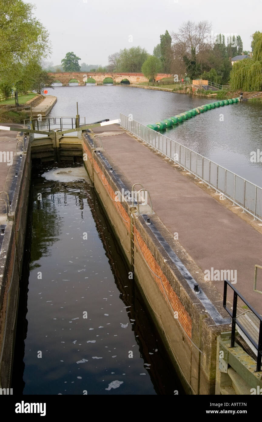 river lock on the ouse with arched bridge in background Stock Photo - Alamy