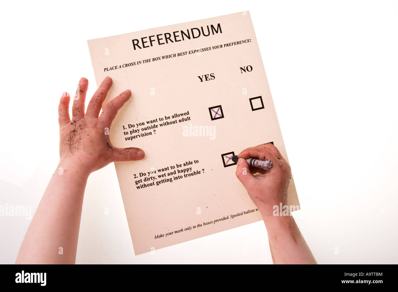 Child filling in the ballot form Stock Photo - Alamy