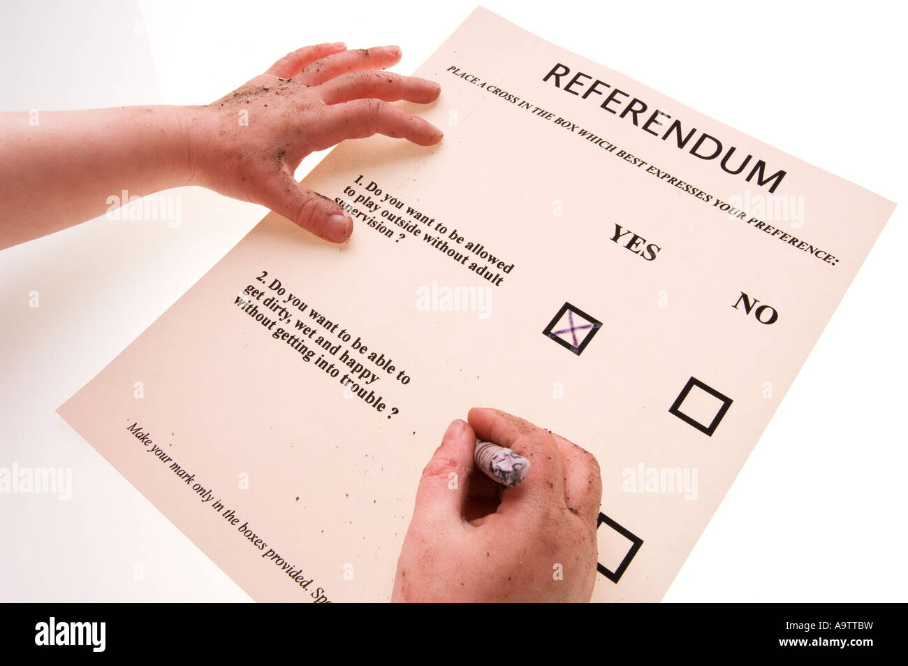Child filling in the ballot form Stock Photo - Alamy
