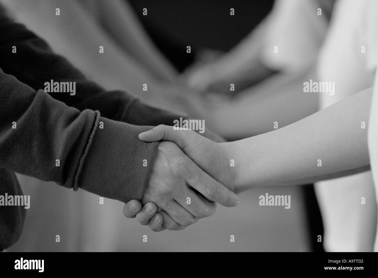Handshake children group hi-res stock photography and images - Alamy