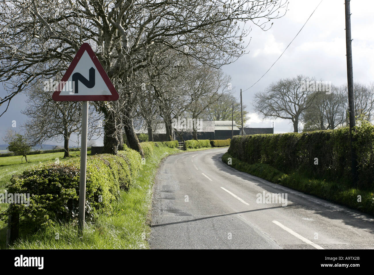 Warning signs of bends in road hi-res stock photography and images - Alamy