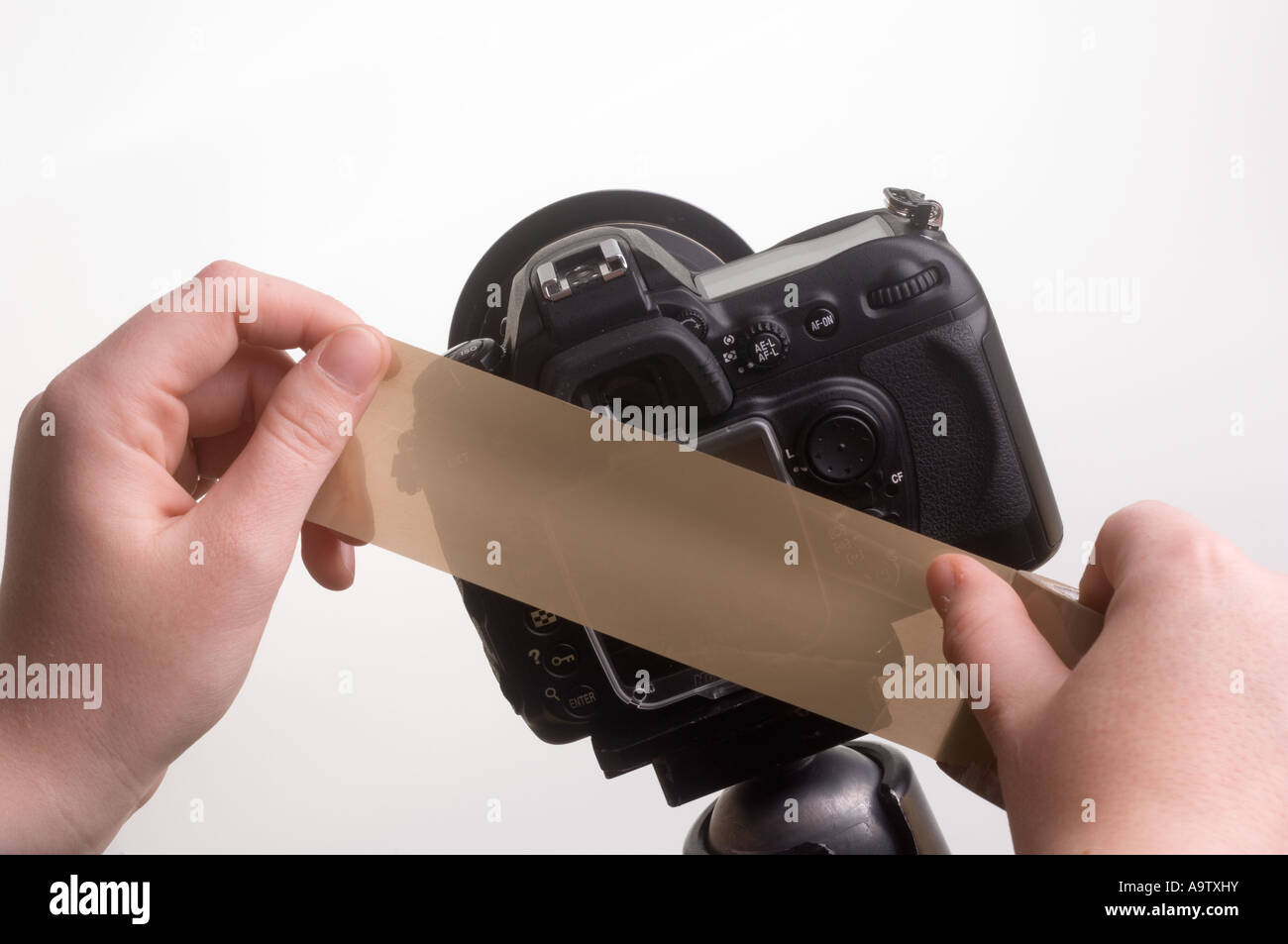 Taping up the LCD review screen Stock Photo - Alamy