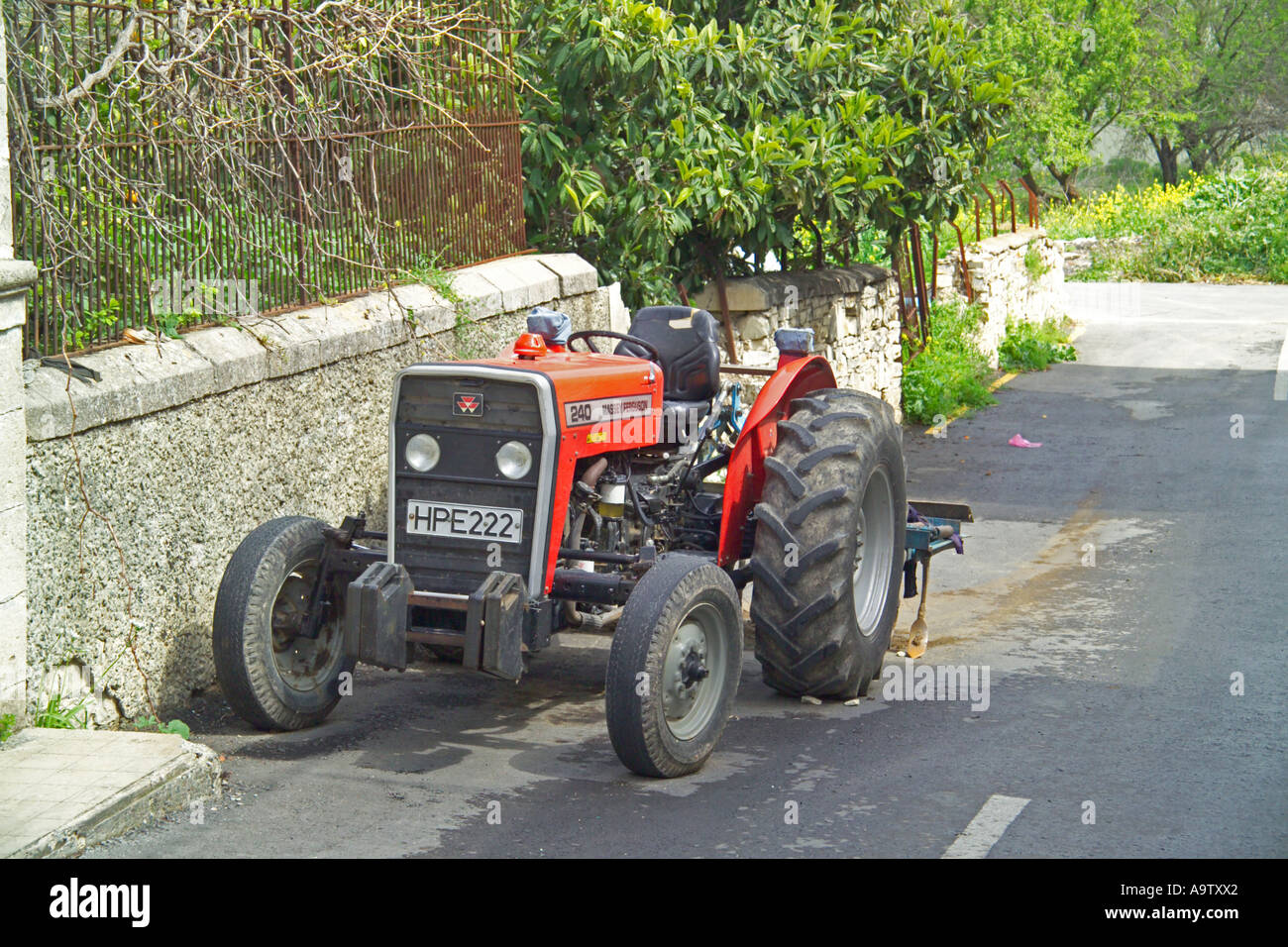 old tractor in the street Stock Photo - Alamy