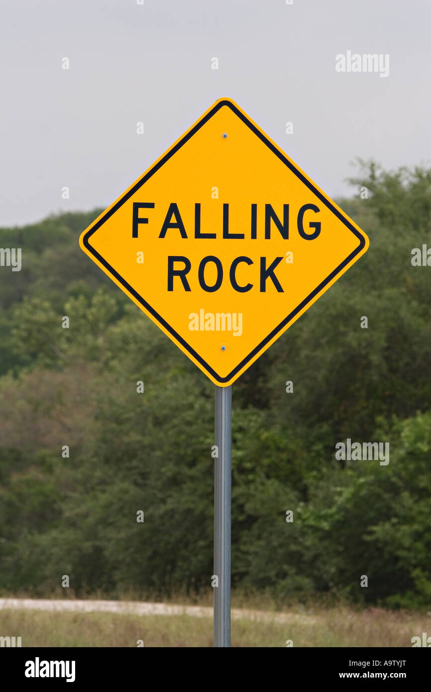 Road sign warning of falling rock Stock Photo - Alamy