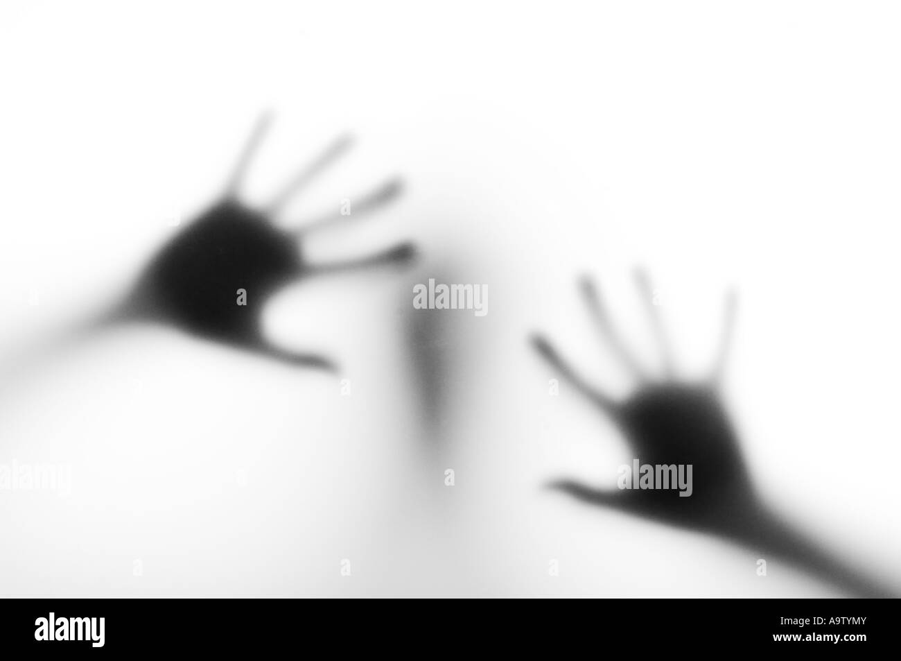 Hands and face behind an opaque surface Stock Photo - Alamy