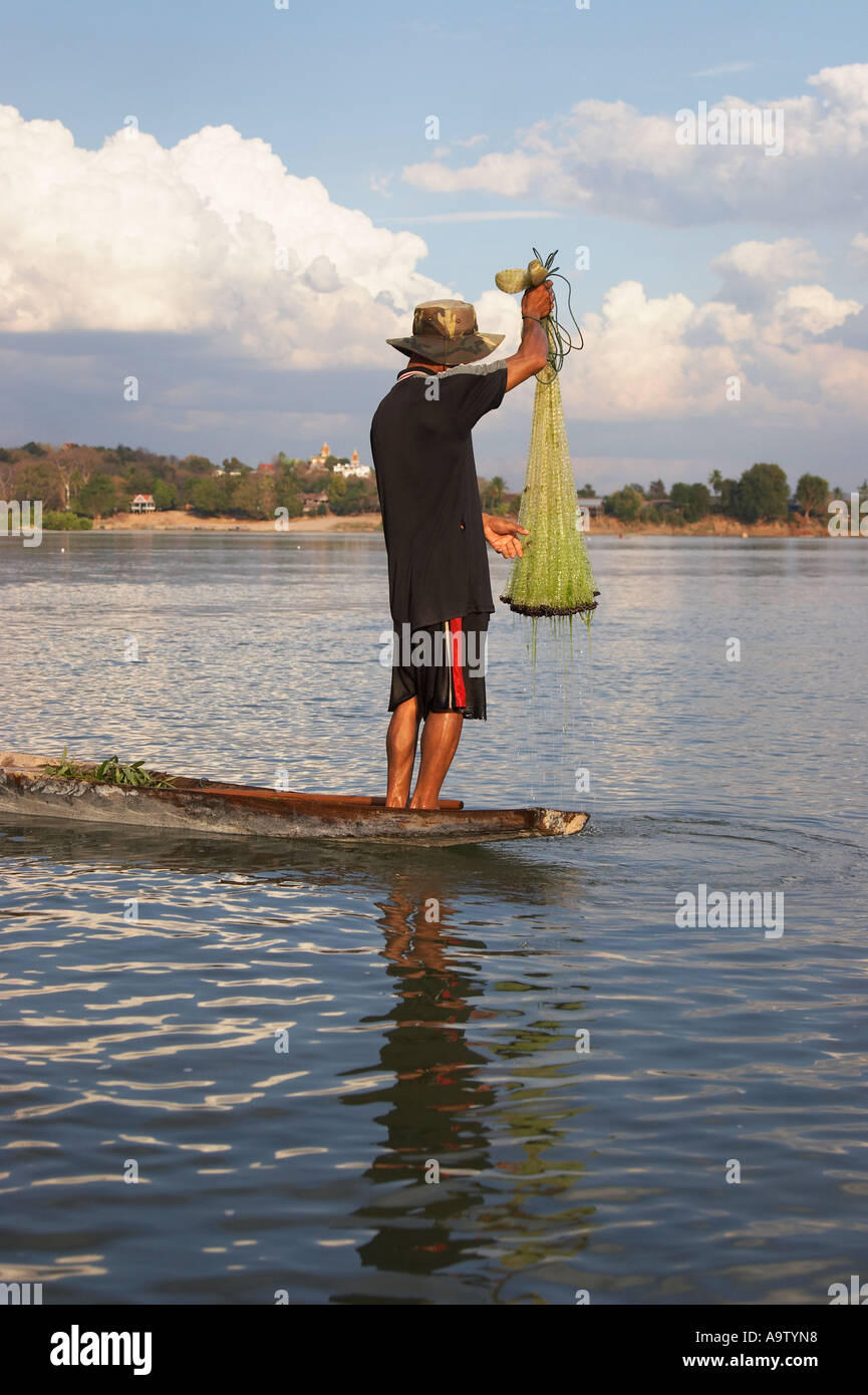Fisherman Holding Fishing Net Stock Photo - Alamy