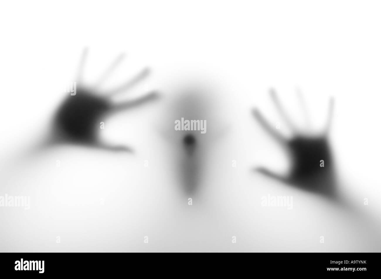 Hands and face behind an opaque surface Stock Photo - Alamy