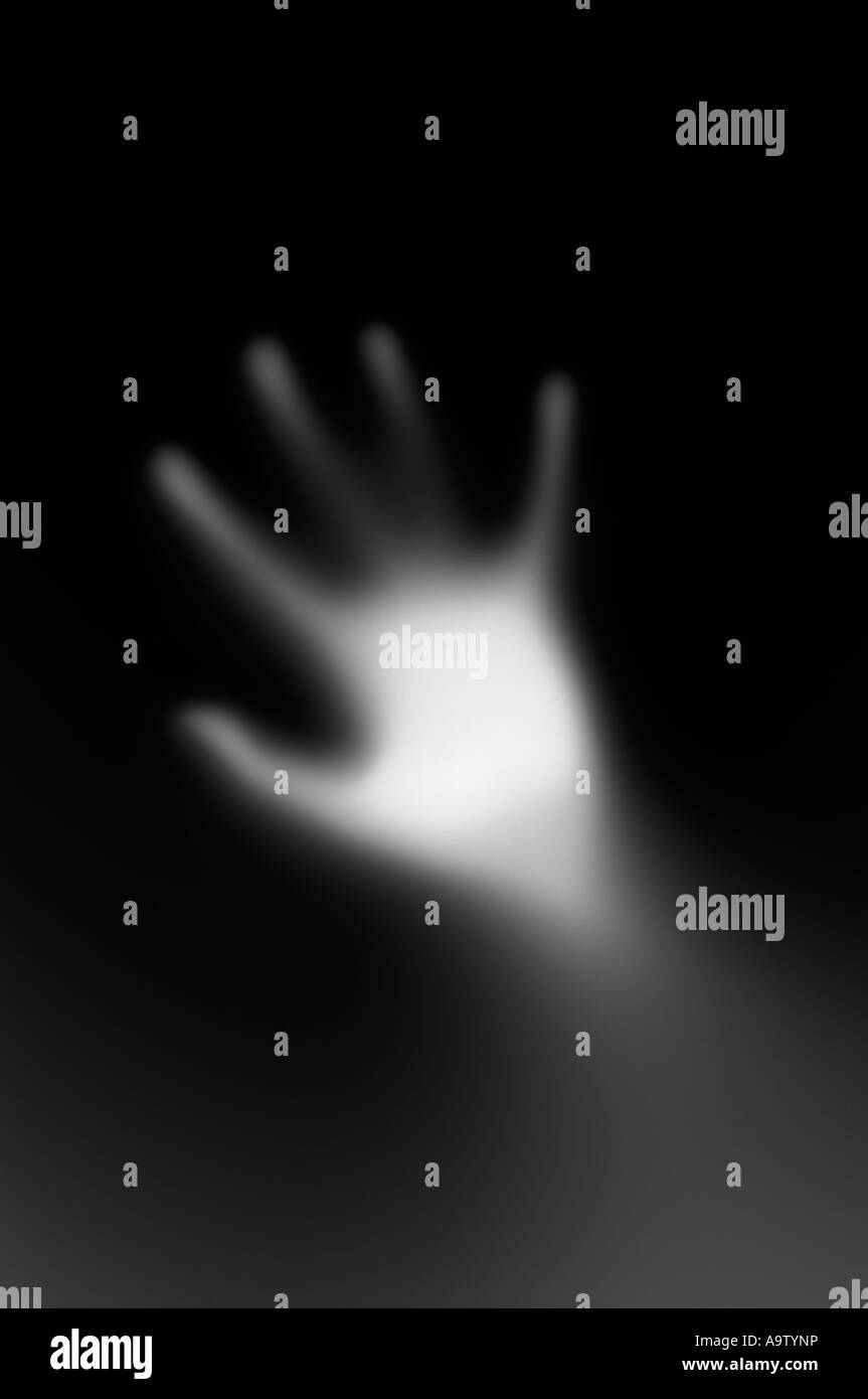 Hand behind an opaque surface Stock Photo - Alamy