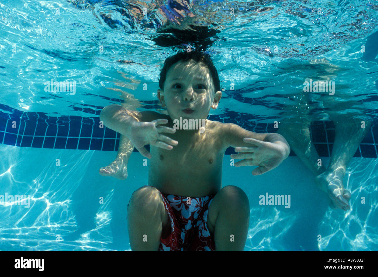 BOY, AGED TWO, Holding breath, underwater in pool Stock Photo - Alamy