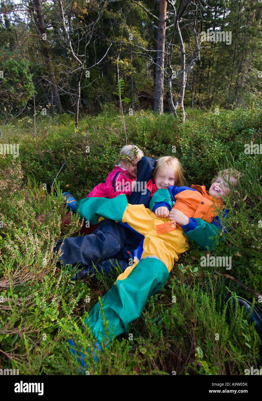Children in a Norwegian naturbarnehage nature nursery having fun in the ...