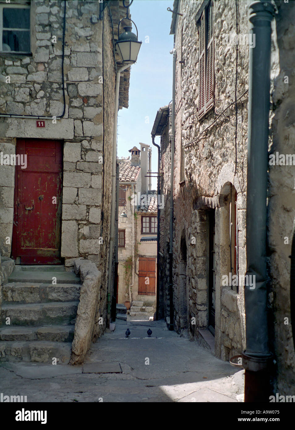 Old stone courtyard and alley French village South of France Stock ...
