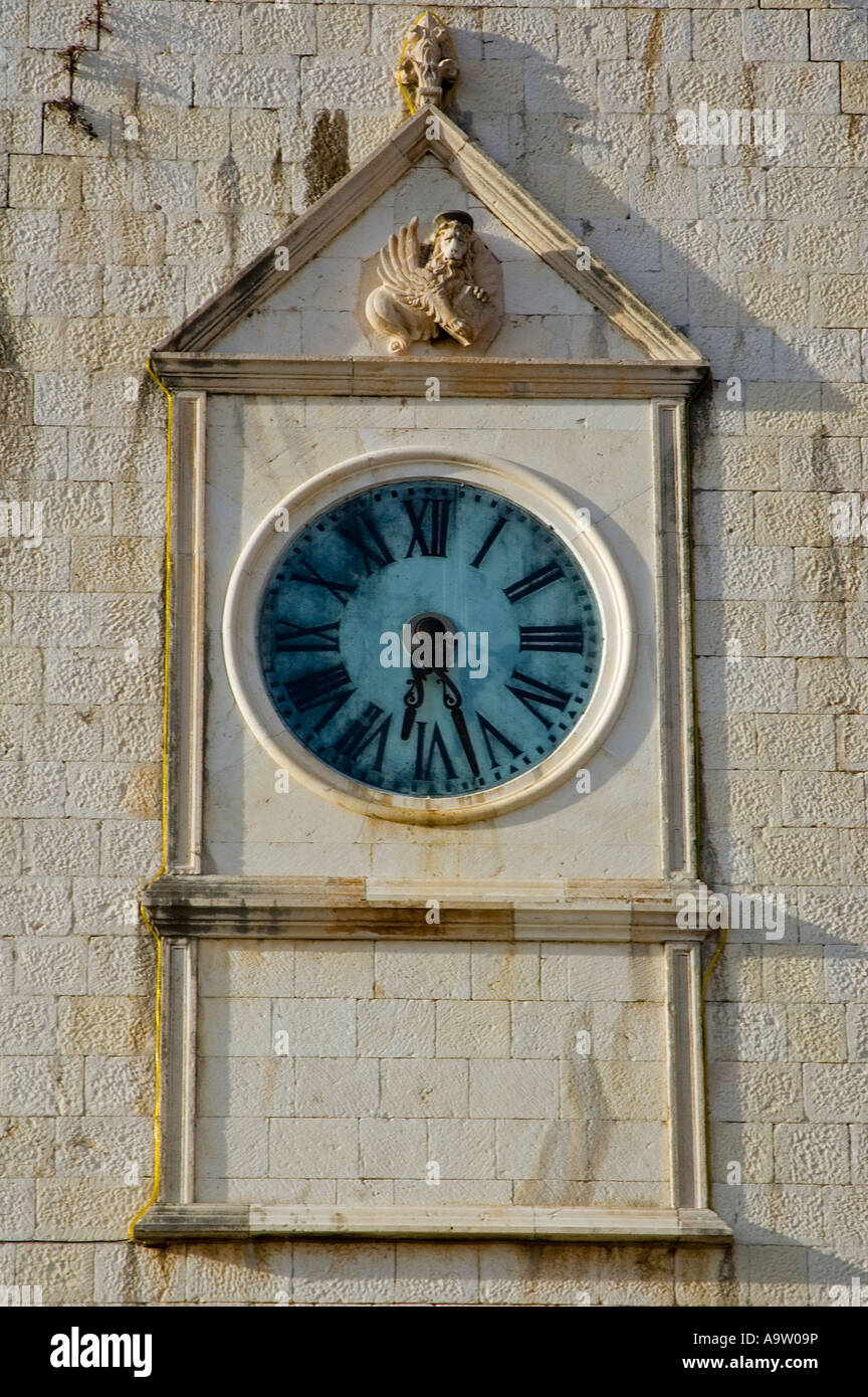 Clock on a historical building, Hvar Old Town, Croatia Stock Photo - Alamy