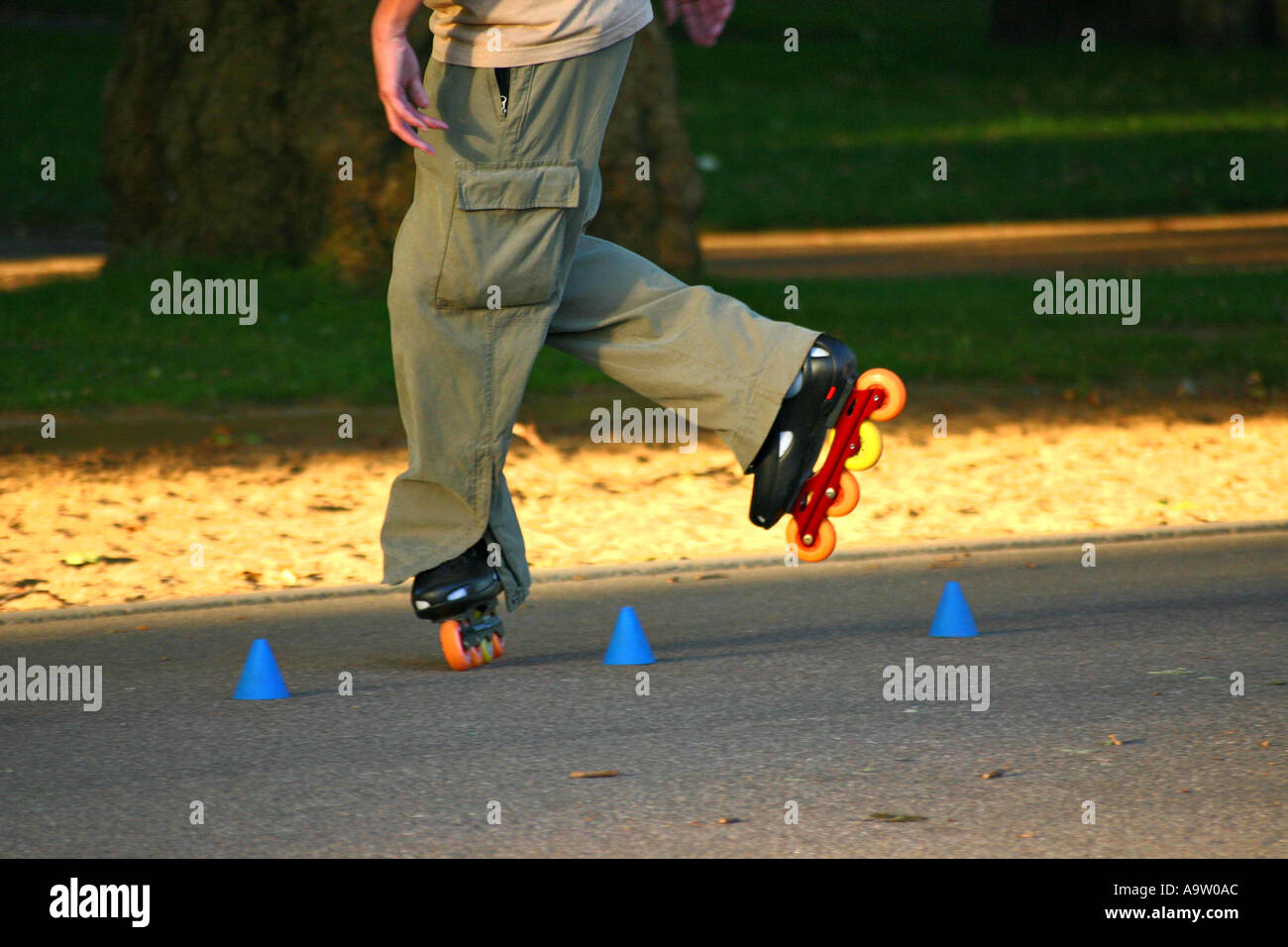 man slalom rollerblading roller blading rollerskating trick fun ...