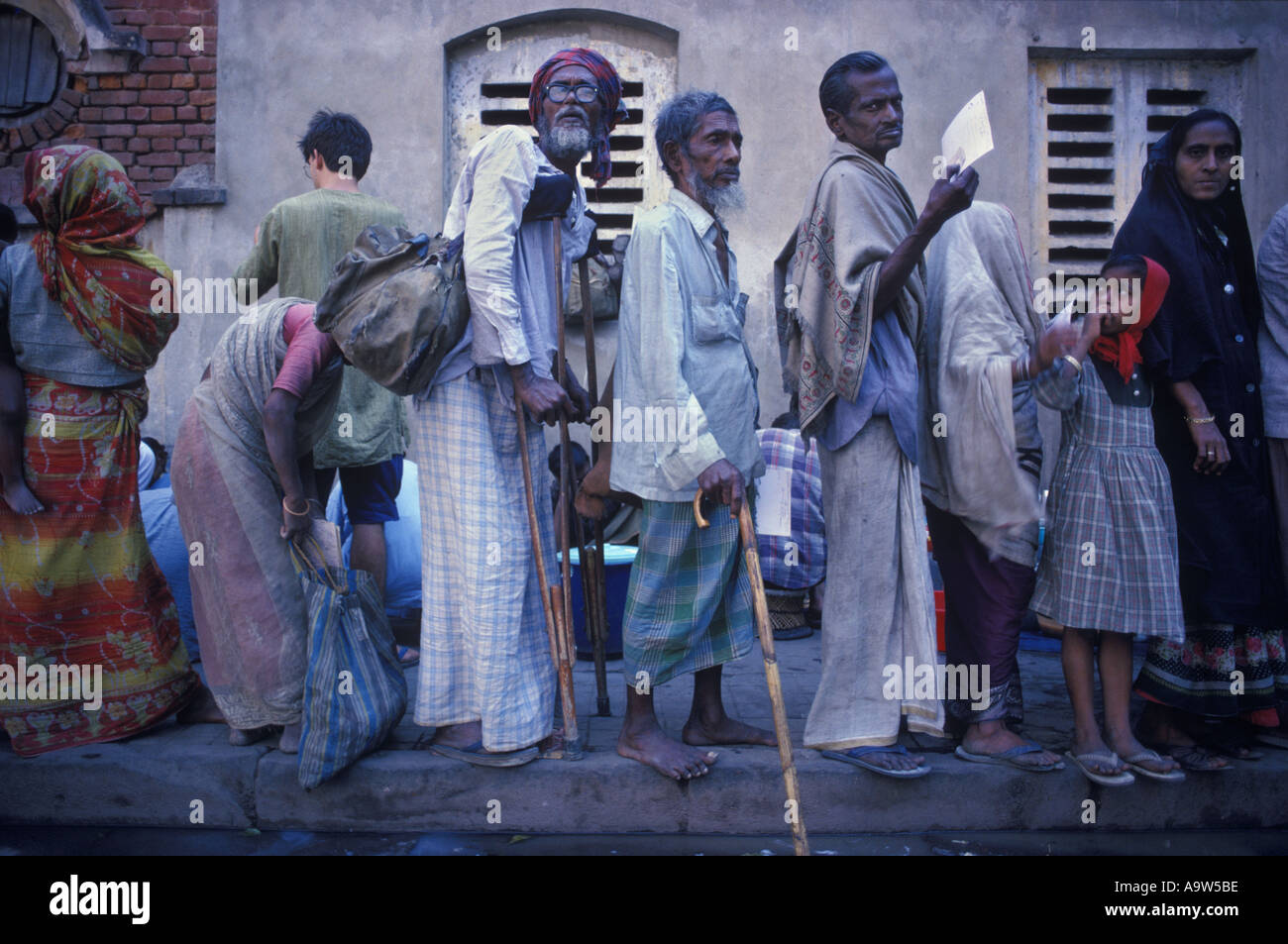 Patients line up at Dr Jack Pregers clinic on Middleton Row Calcutta ...