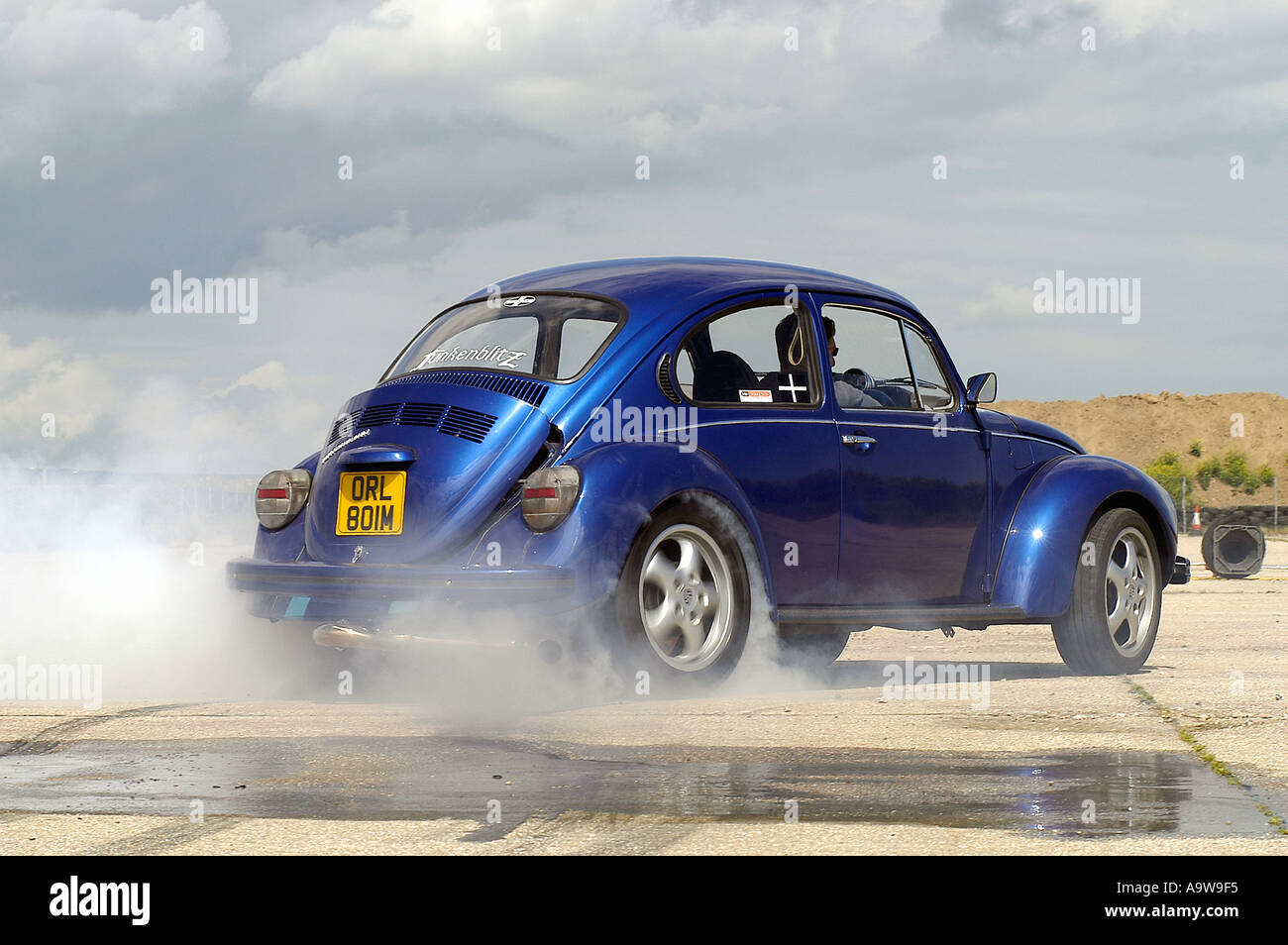 VW Beetle Burning out Stock Photo - Alamy