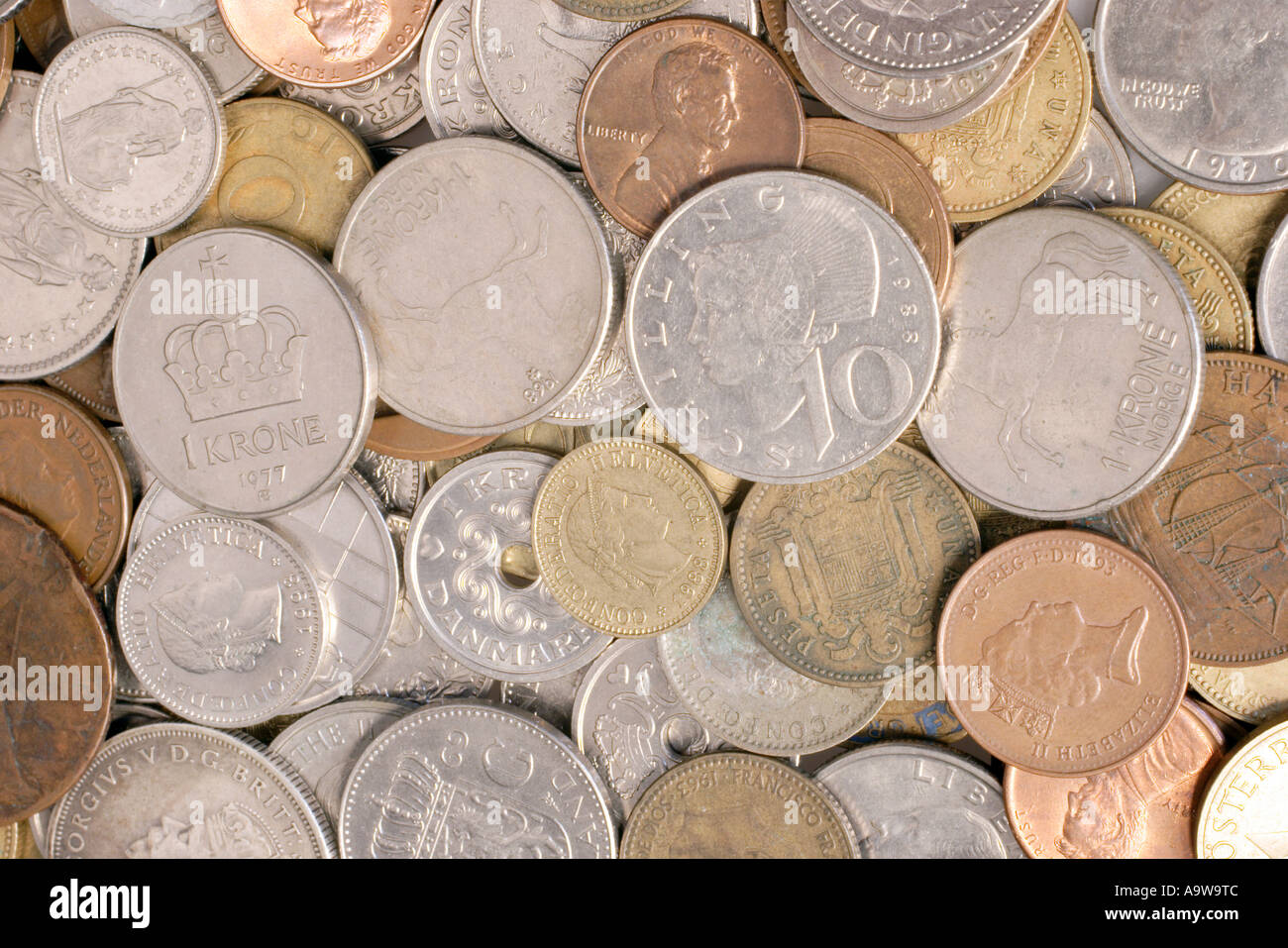 Assorted world coins Stock Photo - Alamy