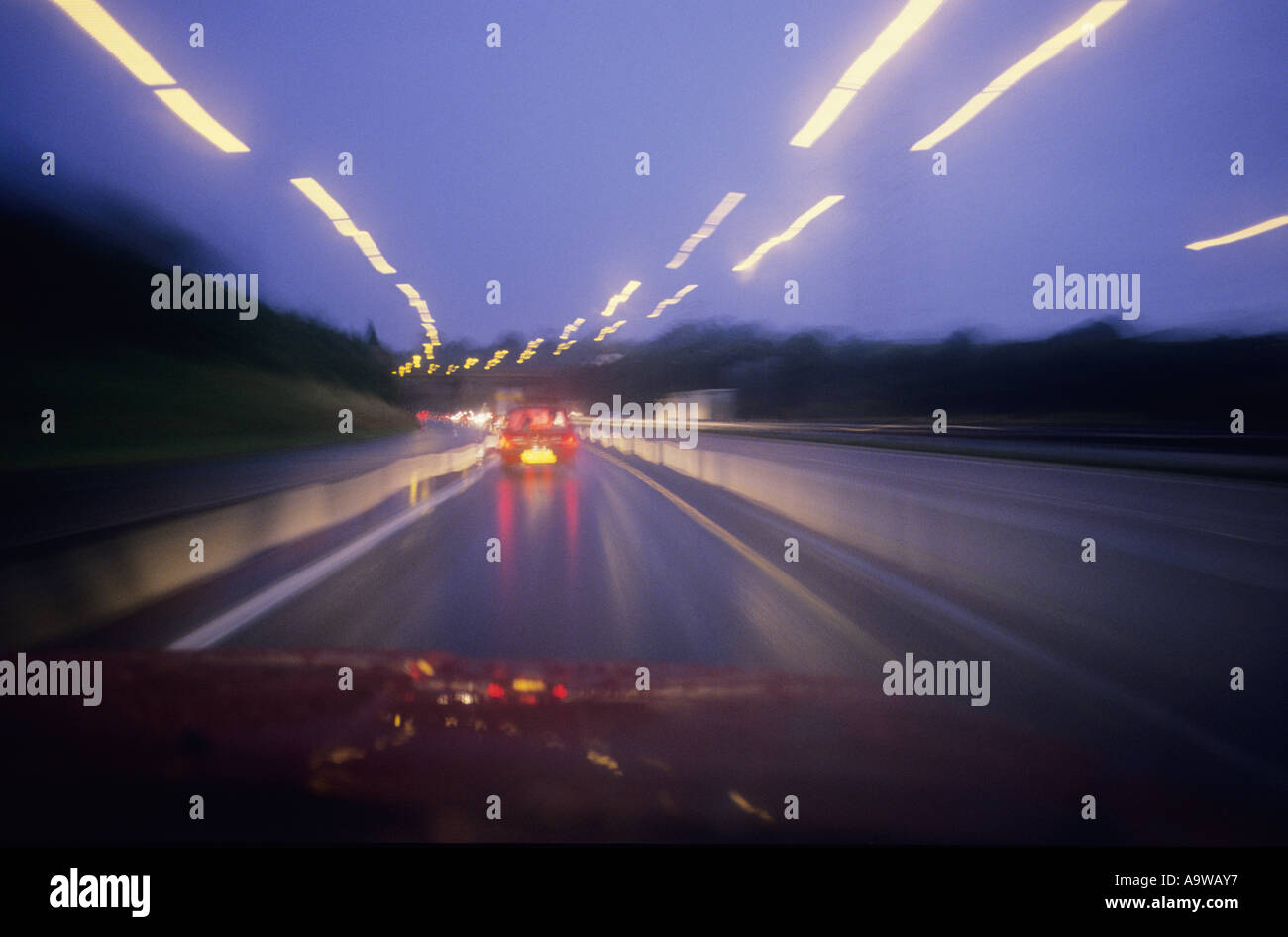Traveling through radworks on the M25 in the wet at night Stock Photo ...