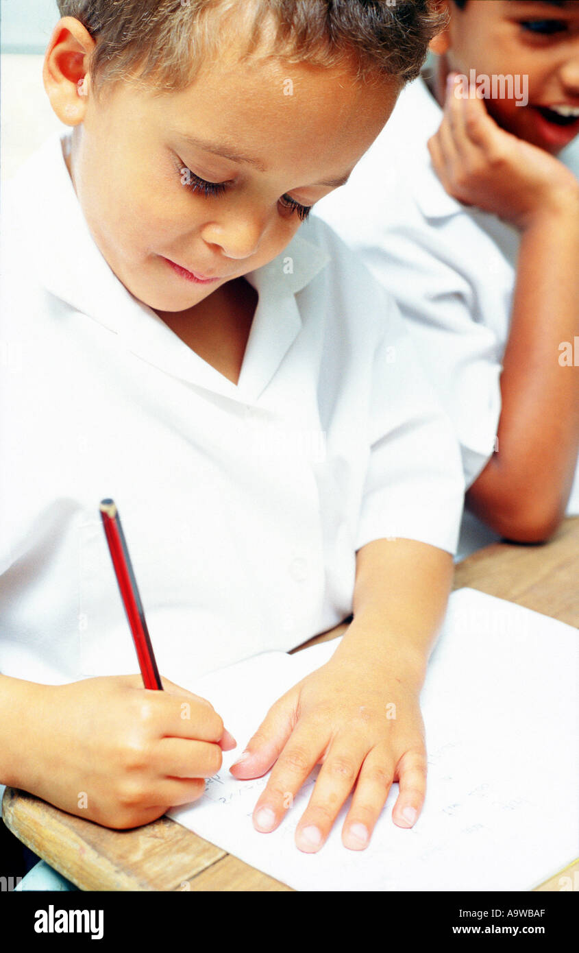 School boy writing Johannesburg Gauteng South Africa Stock Photo - Alamy