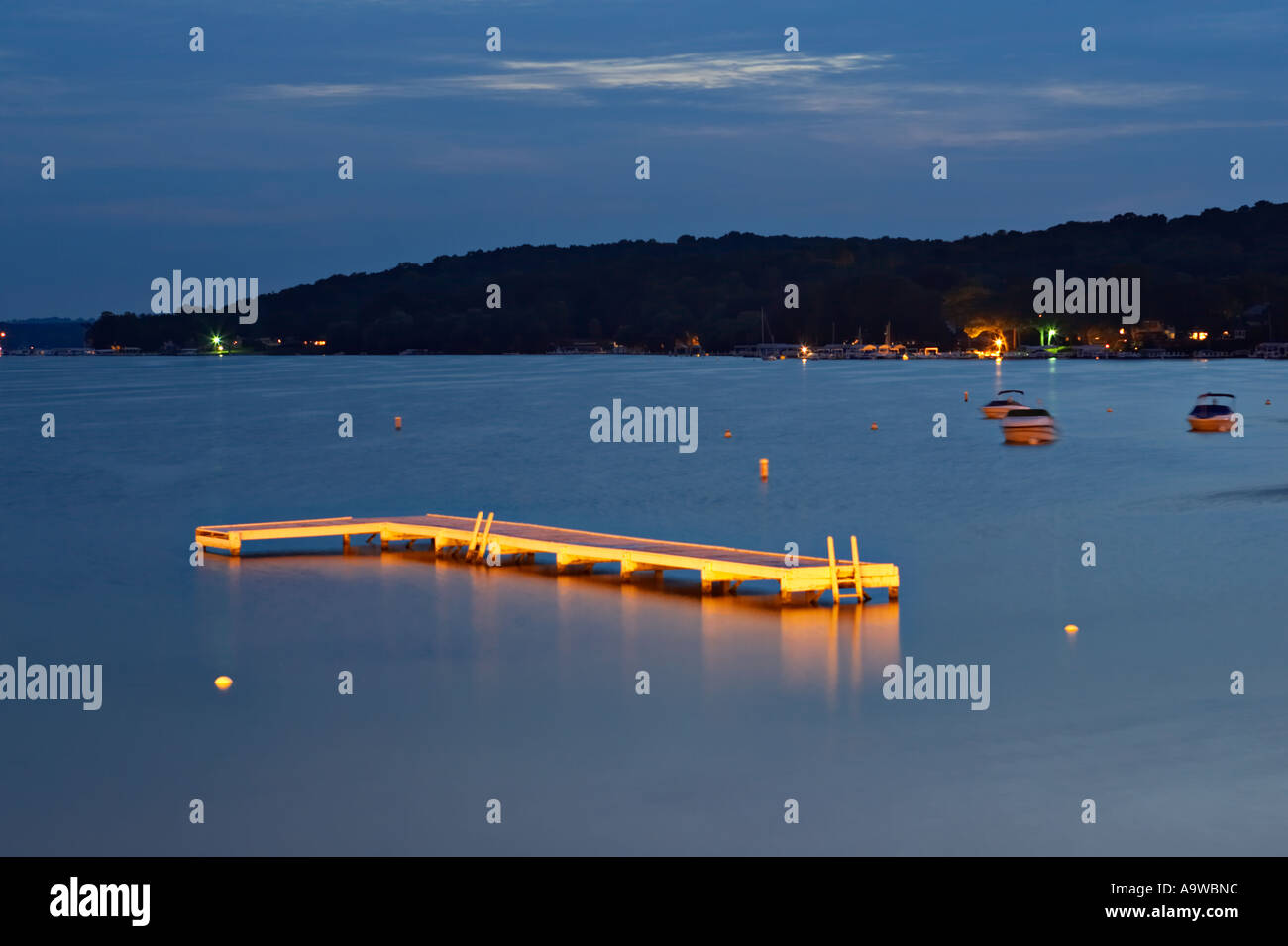 WISCONSIN Lake Geneva Wooden pier in water near beach at popular ...