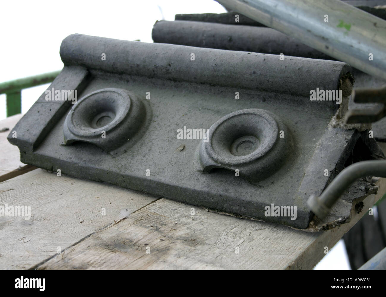 Roof Detail Unusual Ridge Tile with ventilation outlets Stock Photo - Alamy