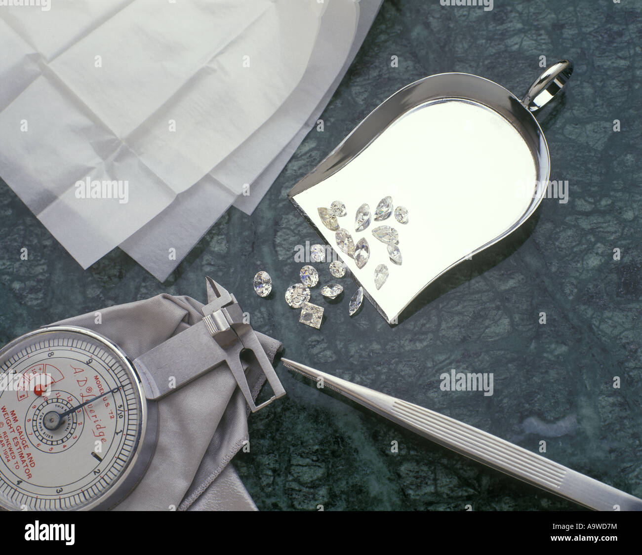 LARGE SIZE DIAMONDS MEASUREMENT GAUGES ON GREEN MARBLE Stock Photo - Alamy