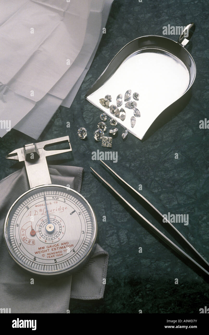 LARGE SIZE DIAMONDS MEASUREMENT GAUGES ON GREEN MARBLE Stock Photo - Alamy