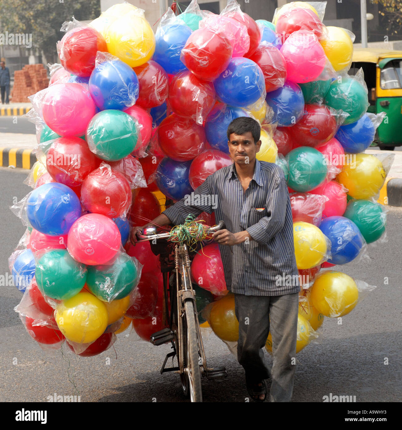 Man selling coloured balls Delhi India Stock Photo - Alamy
