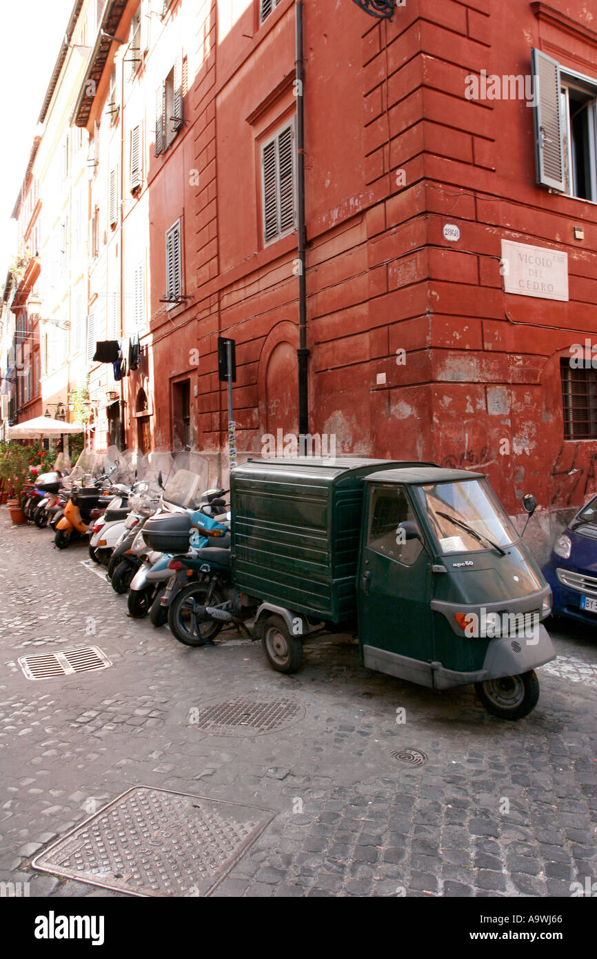 Three wheel mini van in Rome Italy Stock Photo - Alamy
