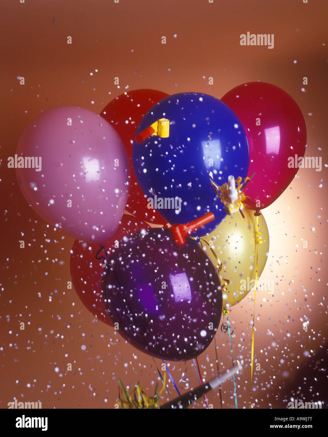 COLOR PARTY BALLOONS AND CONFETTI Stock Photo - Alamy