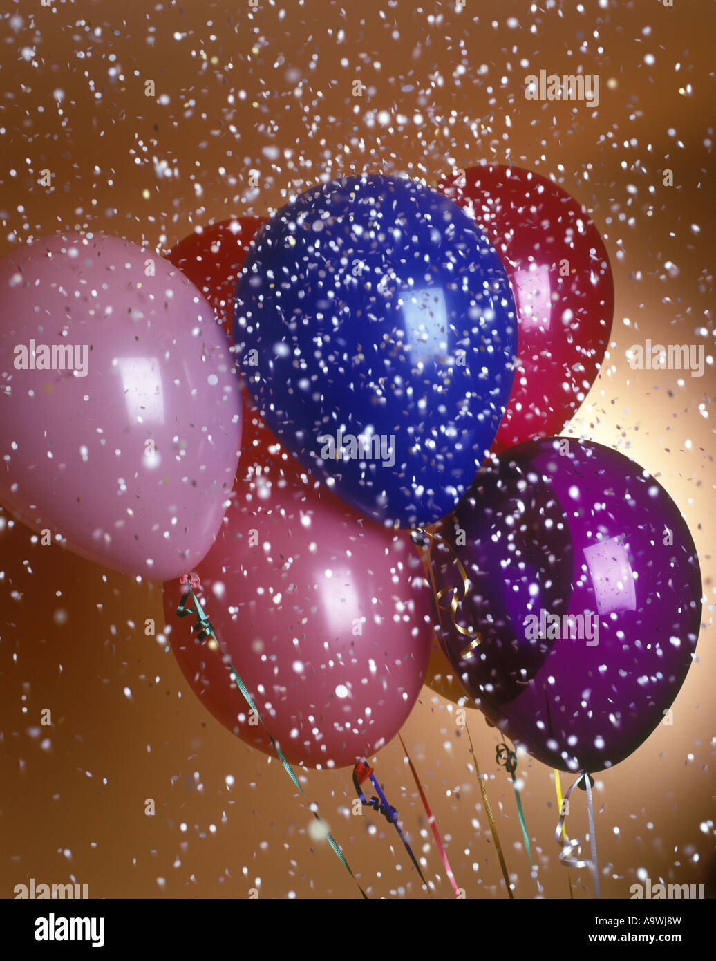 COLOR PARTY BALLOONS AND CONFETTI Stock Photo - Alamy
