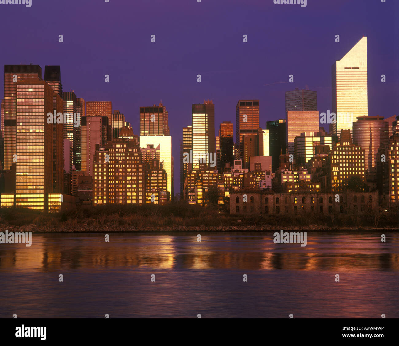 CITI CORP BUILDING REFLECTED IN EAST RIVER MIDTOWN SKYLINE MANHATTAN ...