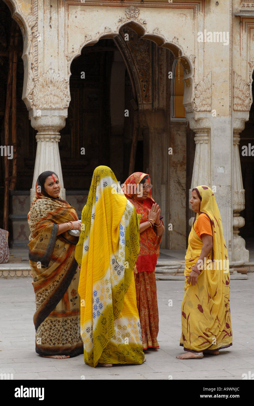 Women in a Hindu temple Jaipur the pink city Rajasthan India Stock ...
