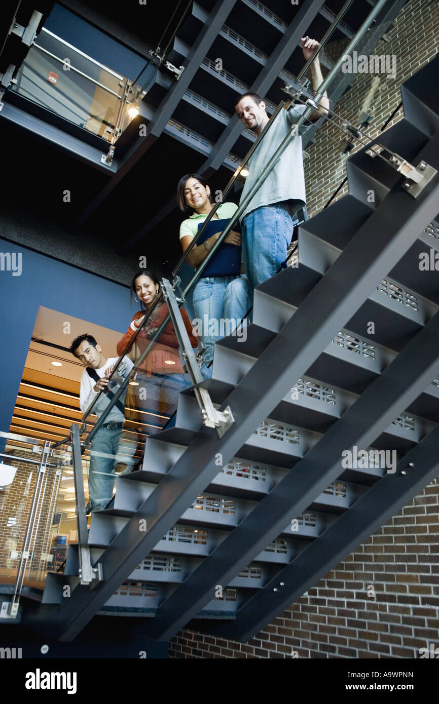 Portrait of college students standing on staircase Stock Photo - Alamy