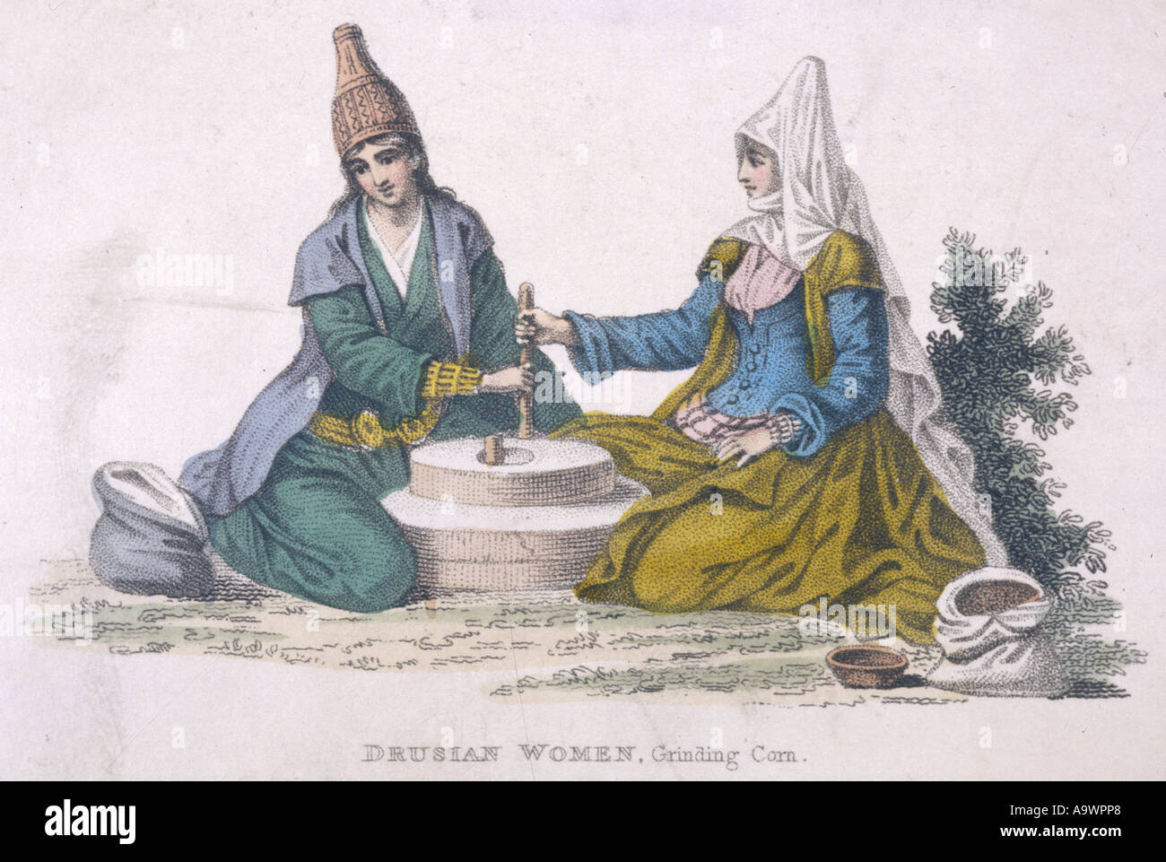 Women grinding corn hi-res stock photography and images - Alamy