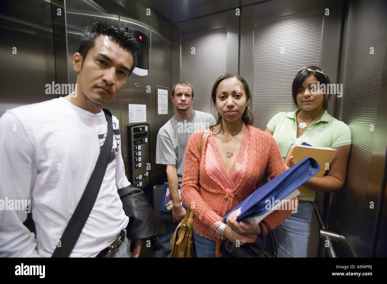 University students elevator lift hi-res stock photography and images ...